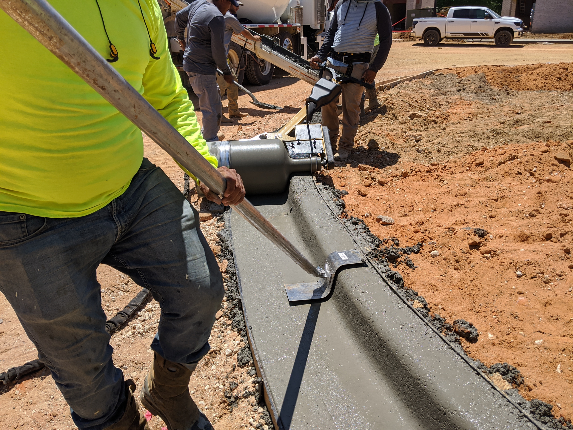 Curb Roller’s CM4000 Shapes Concrete for Curb and Gutter Work | Rental ...